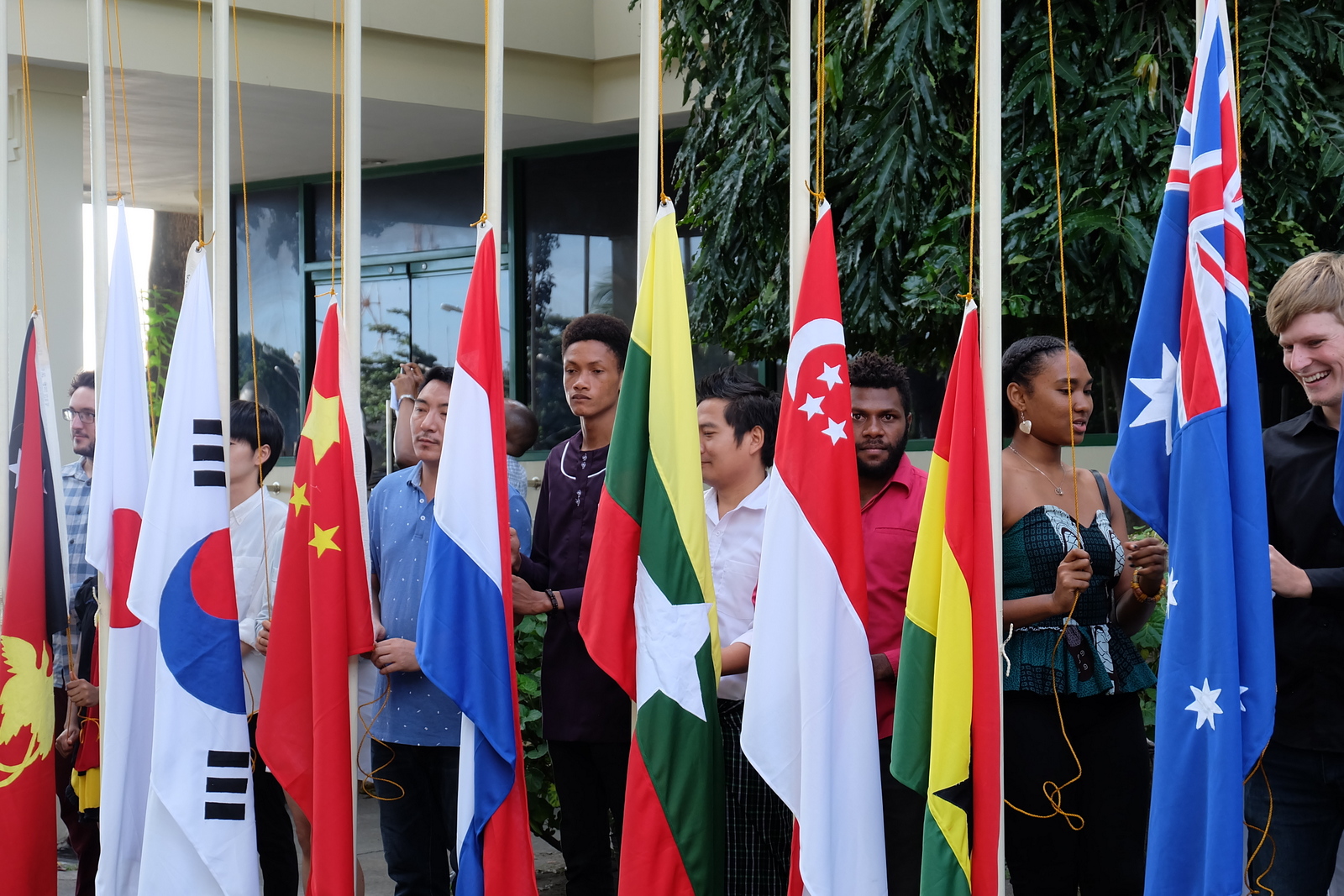 59 national flags raised to open International Cultural Exchange Month ...