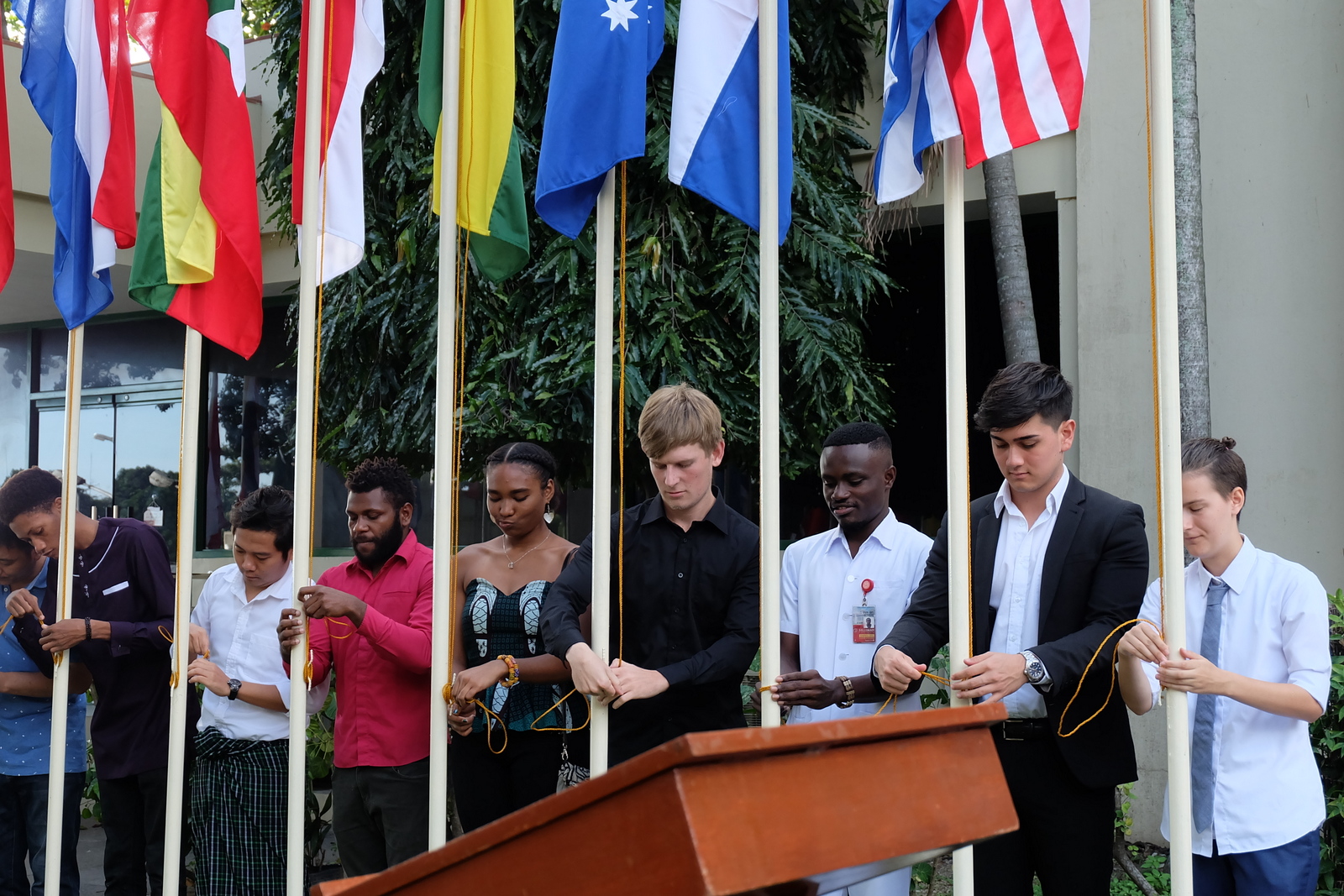 59 national flags raised to open International Cultural Exchange Month ...